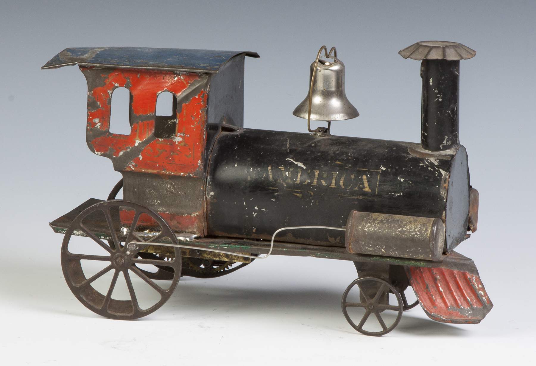 "America" Early Painted Tin Clock Work Locomotive | Cottone Auctions