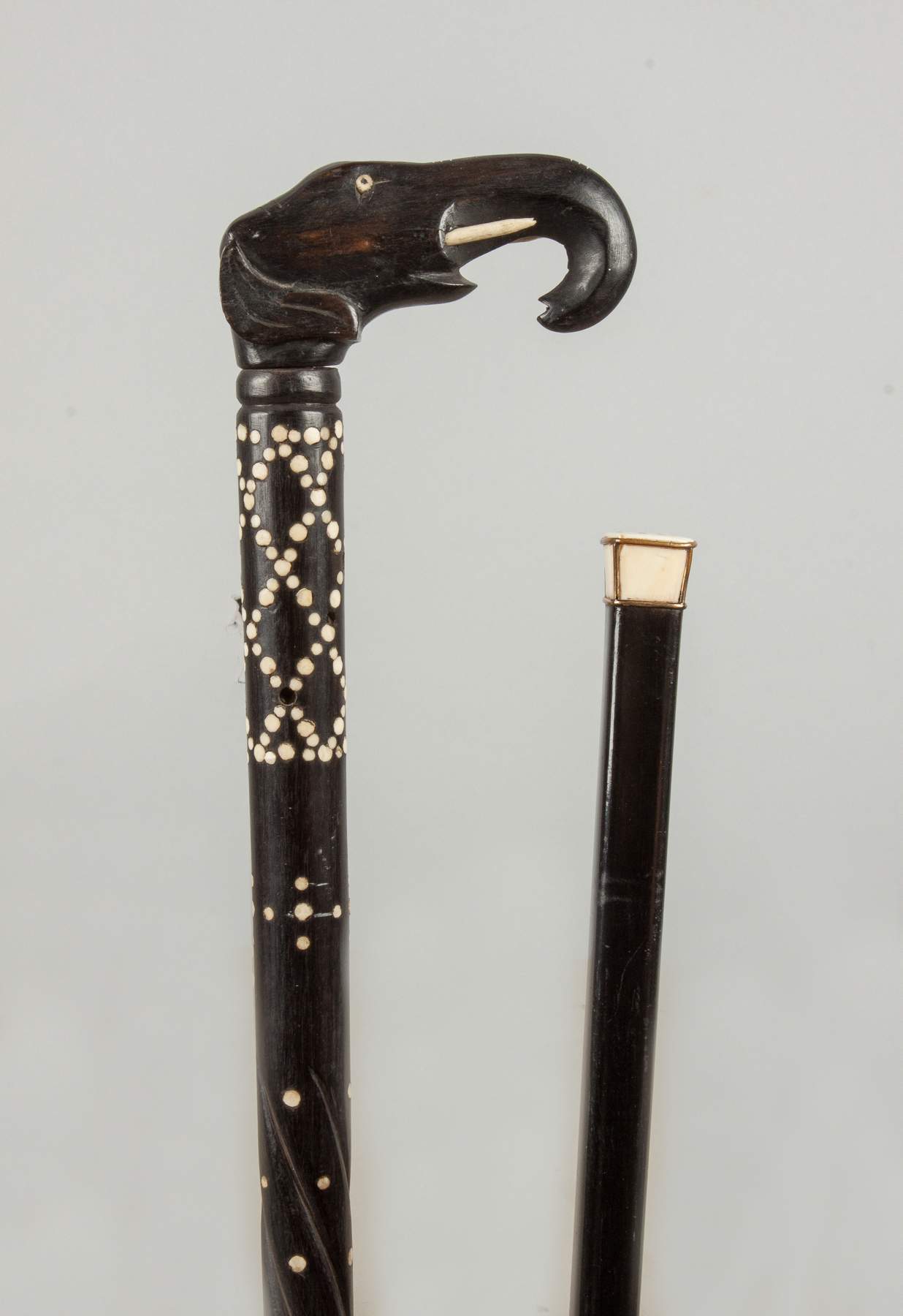 Two Ebonized Decorative Canes | Cottone Auctions