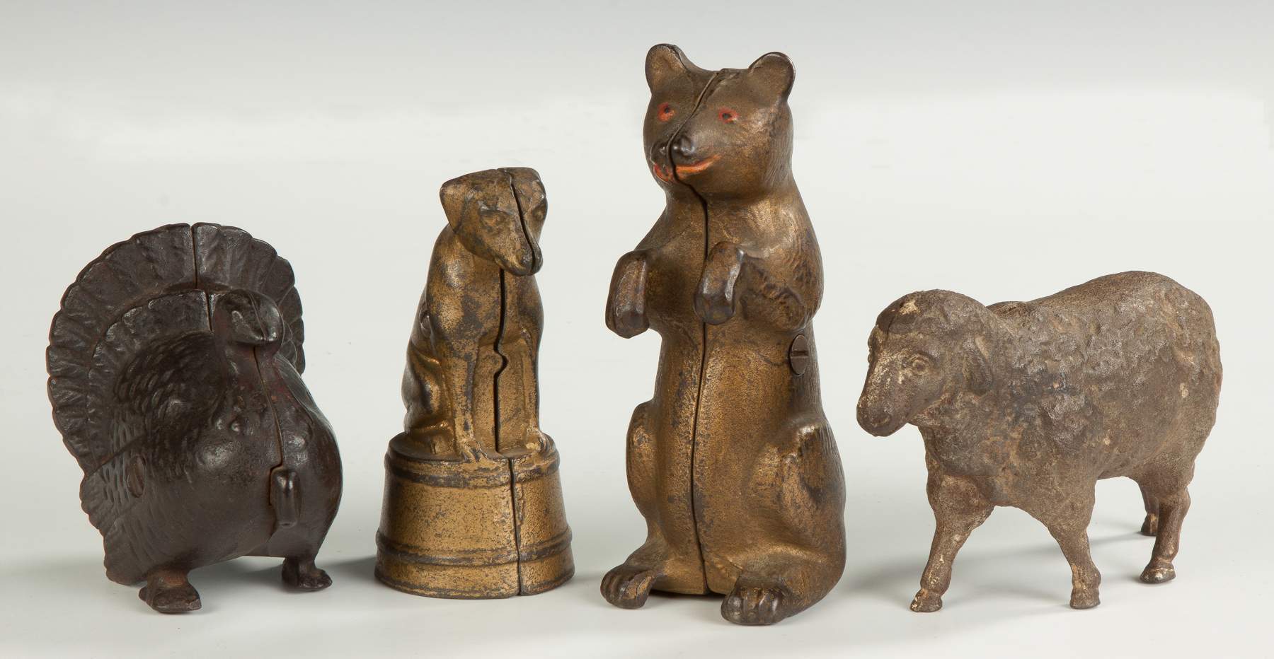 Group of Four Vintage Cast Iron Banks | Cottone Auctions