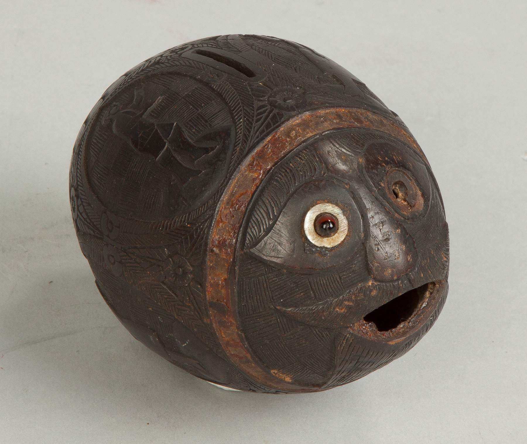 Carved Coconut Bank | Cottone Auctions