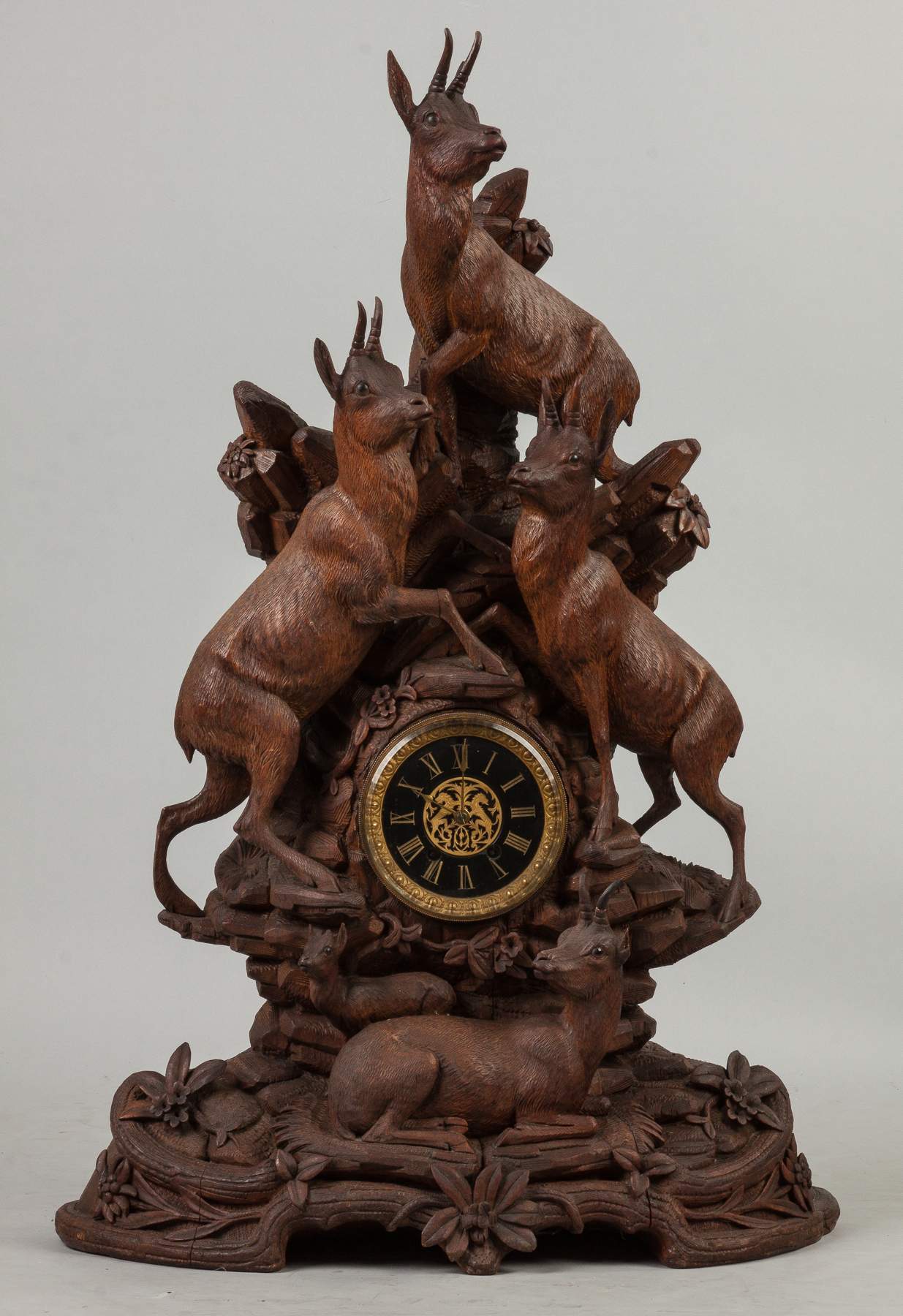 Carved Black Forest Clock with Mountain Goats and Foliage | Cottone ...