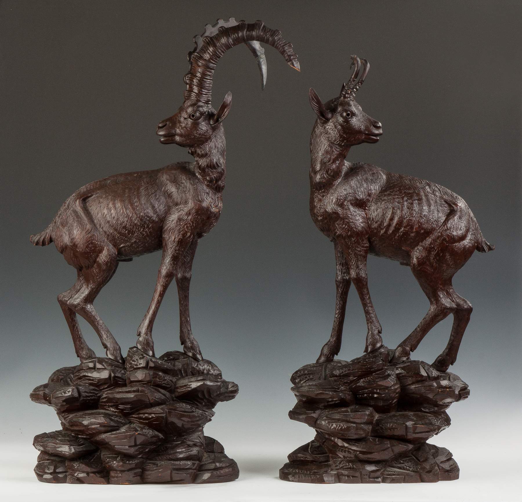 Two Black Forrest Carved Mountain Goats | Cottone Auctions