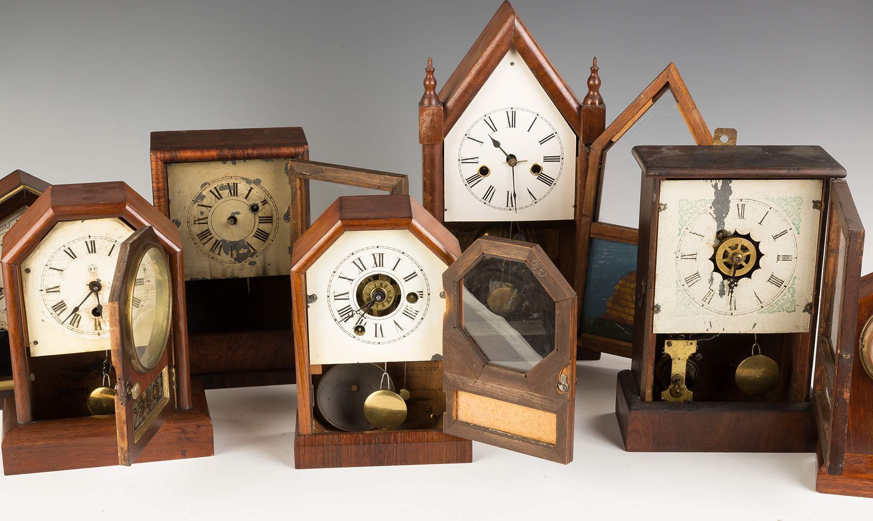 Group of Miniature Shelf Clocks | Cottone Auctions