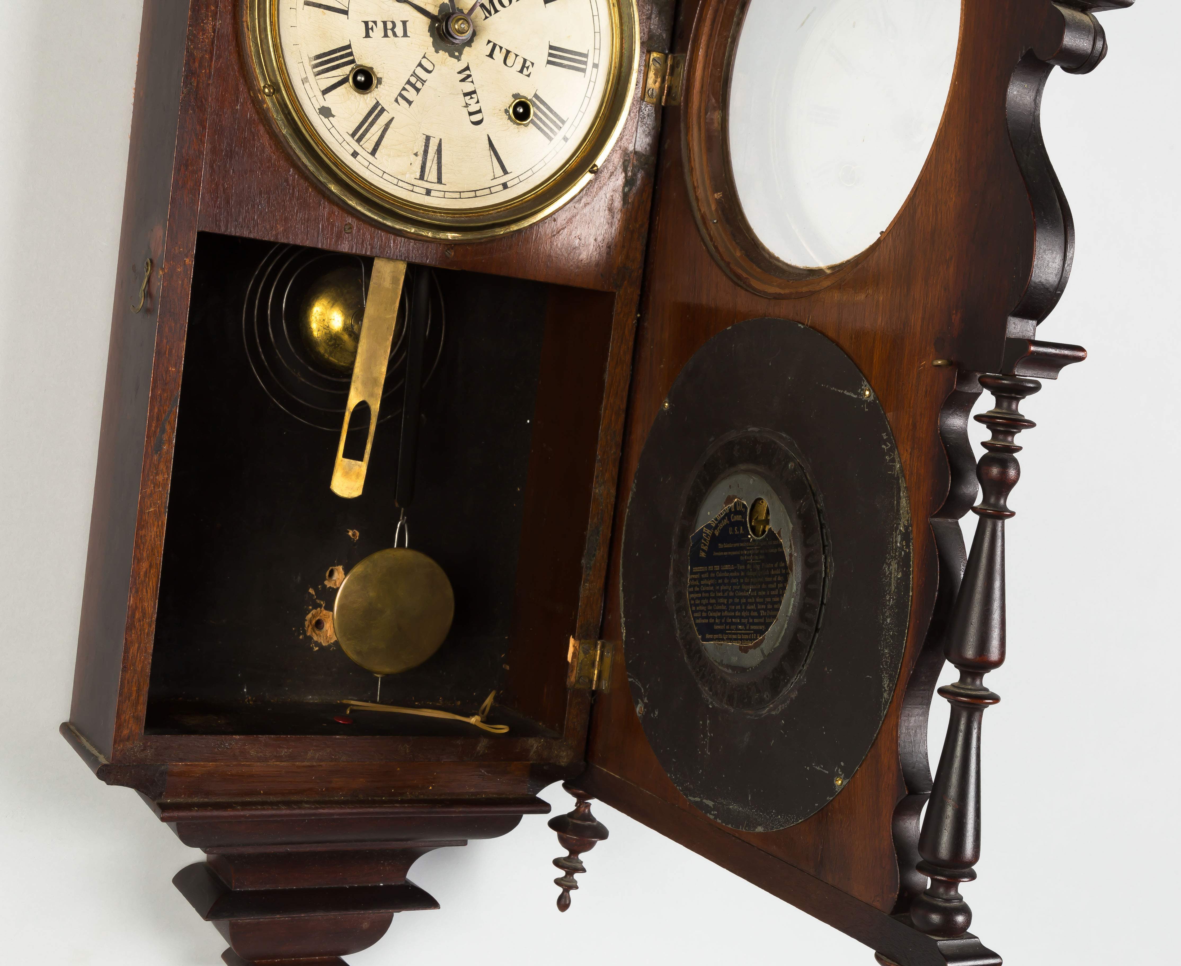 Welch Spring & Co. Victorian Hanging Calendar Clock | Cottone Auctions