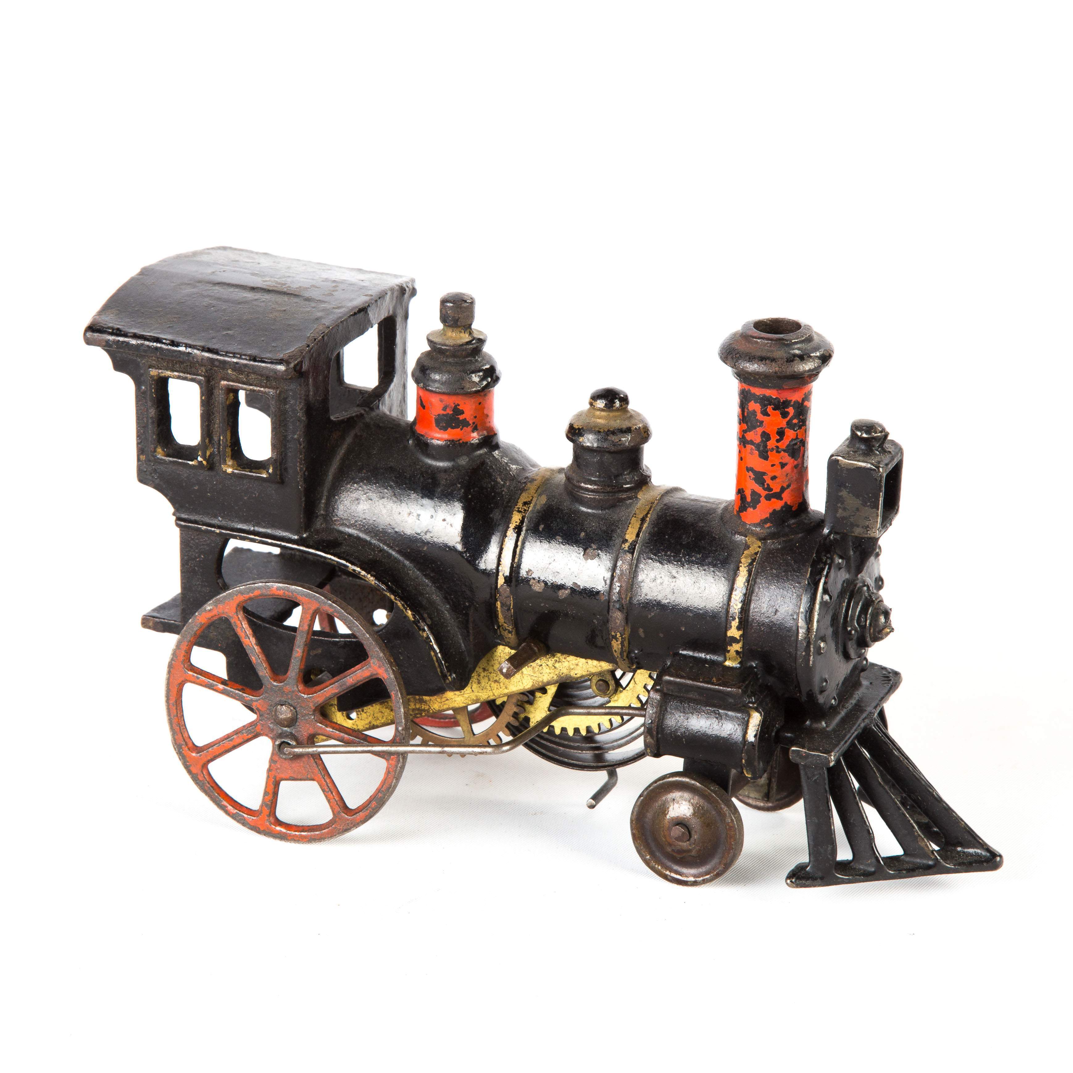 Cast Iron Clockwork Train | Cottone Auctions