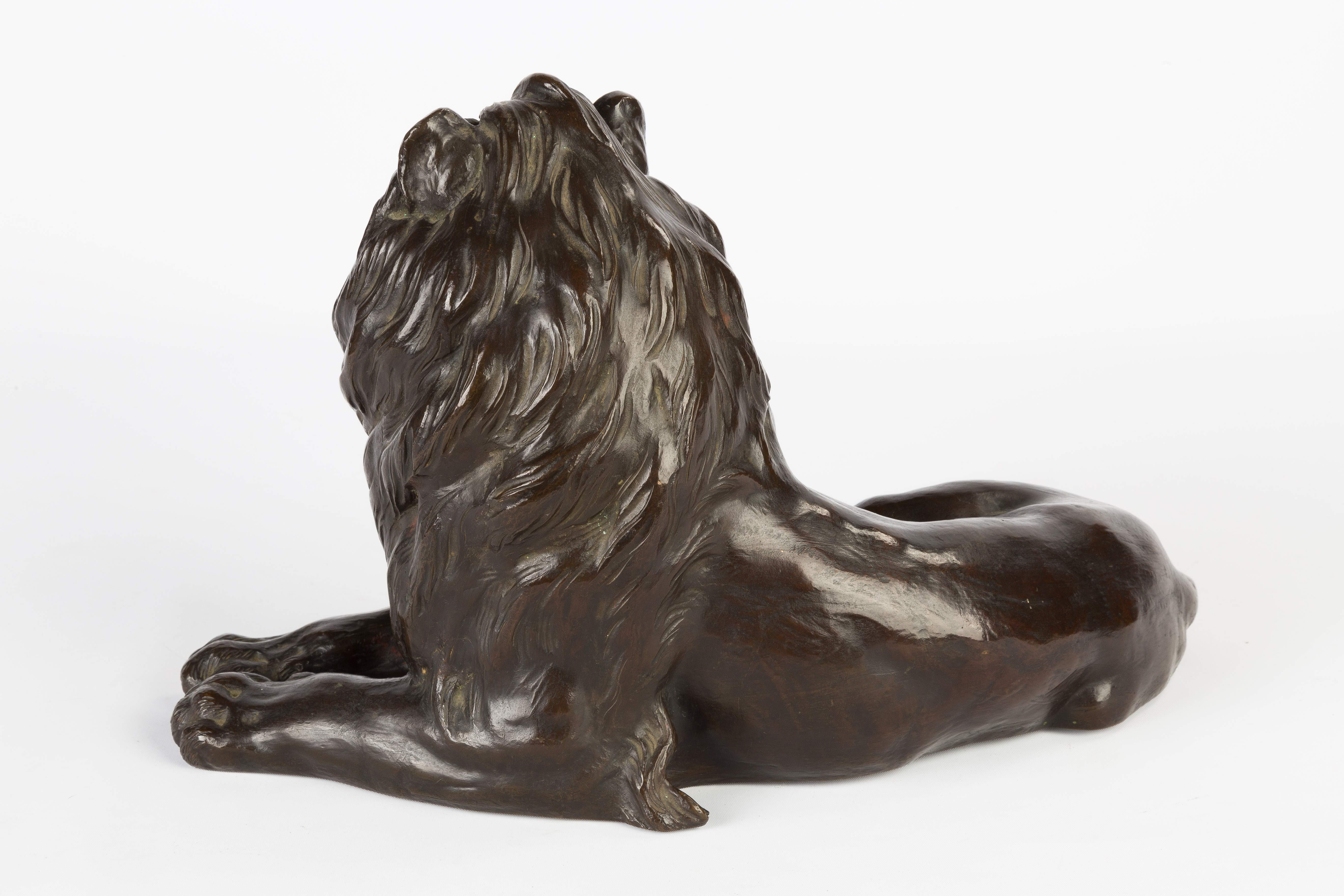 Asian Reclining Bronze Lion | Cottone Auctions