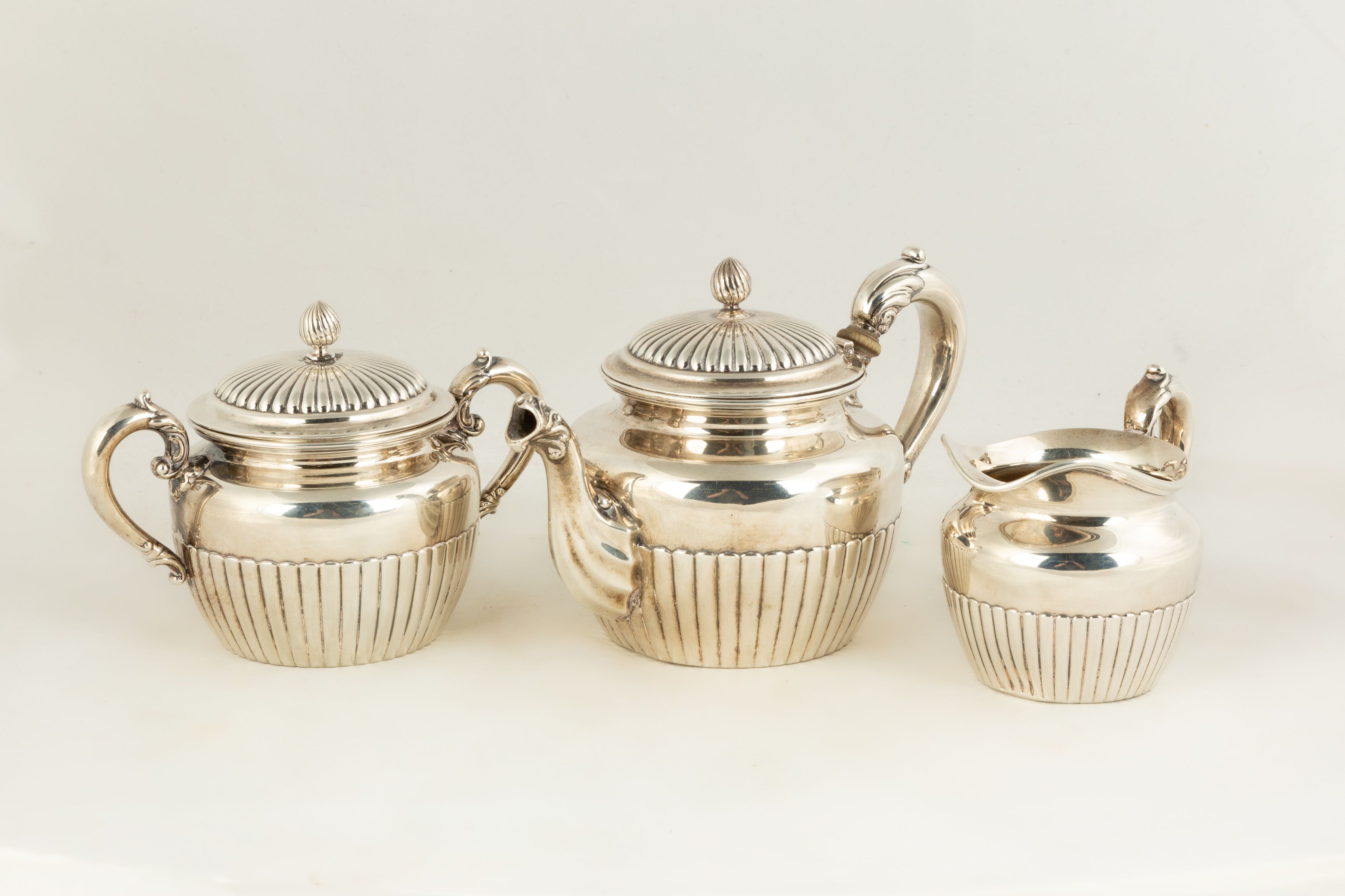 Two Gorham Sterling Silver Three Piece Tea Sets | Cottone Auctions