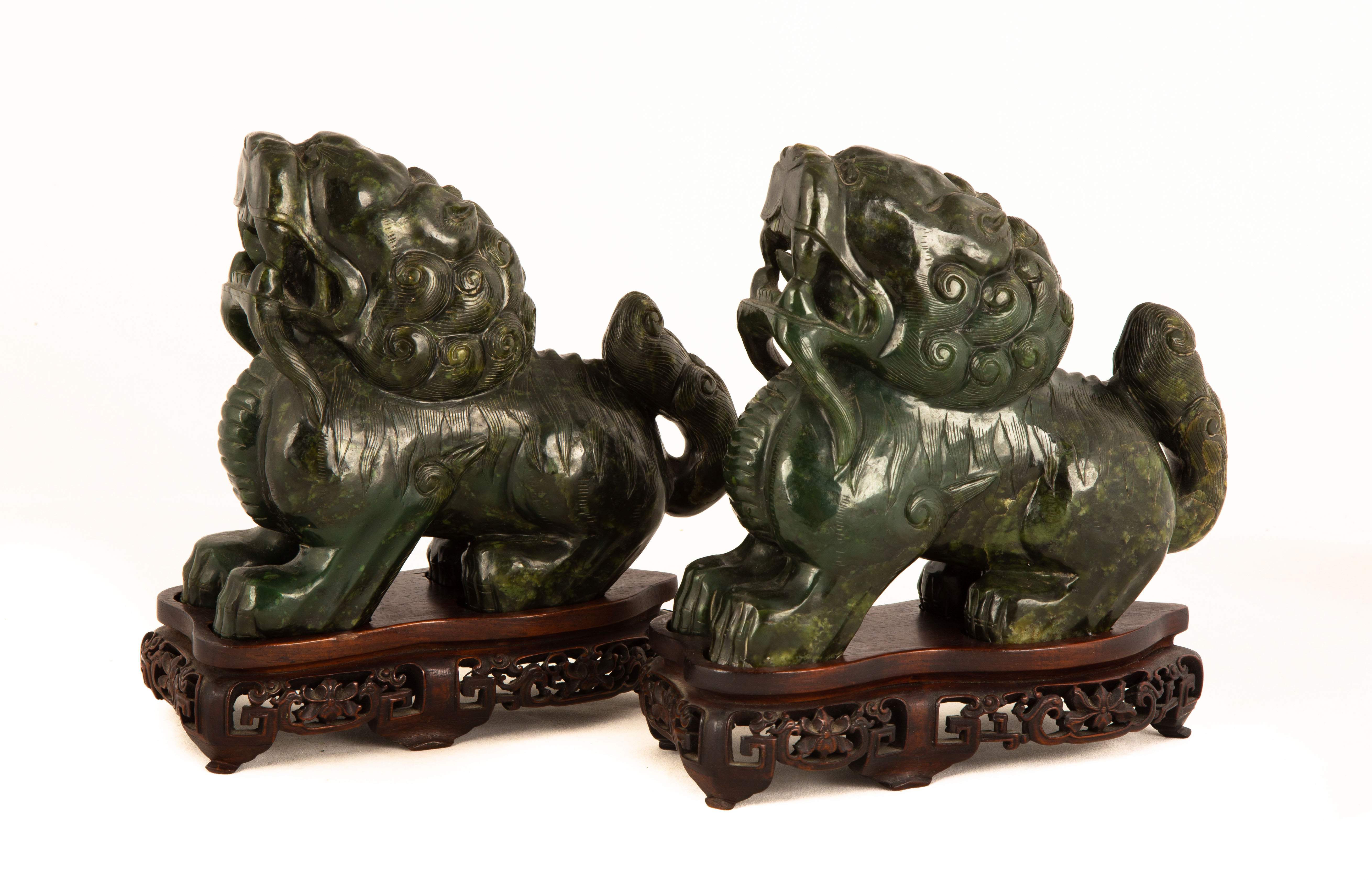 Pair of Spinach Jade Foo Dogs | Cottone Auctions