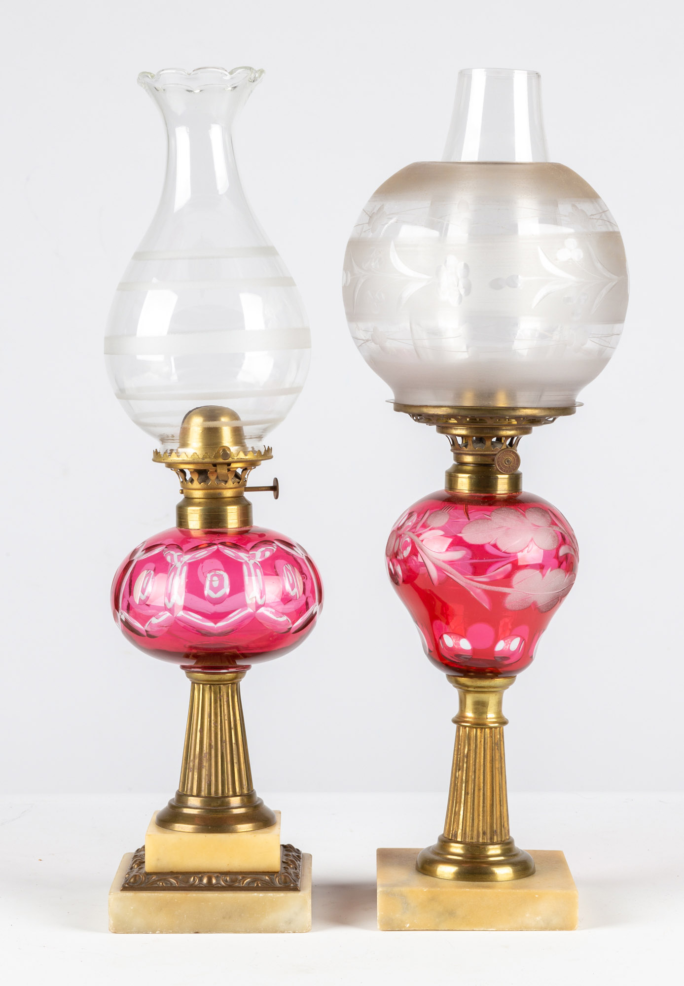 (2) Cranberry Overlay Oil Lamps | Cottone Auctions