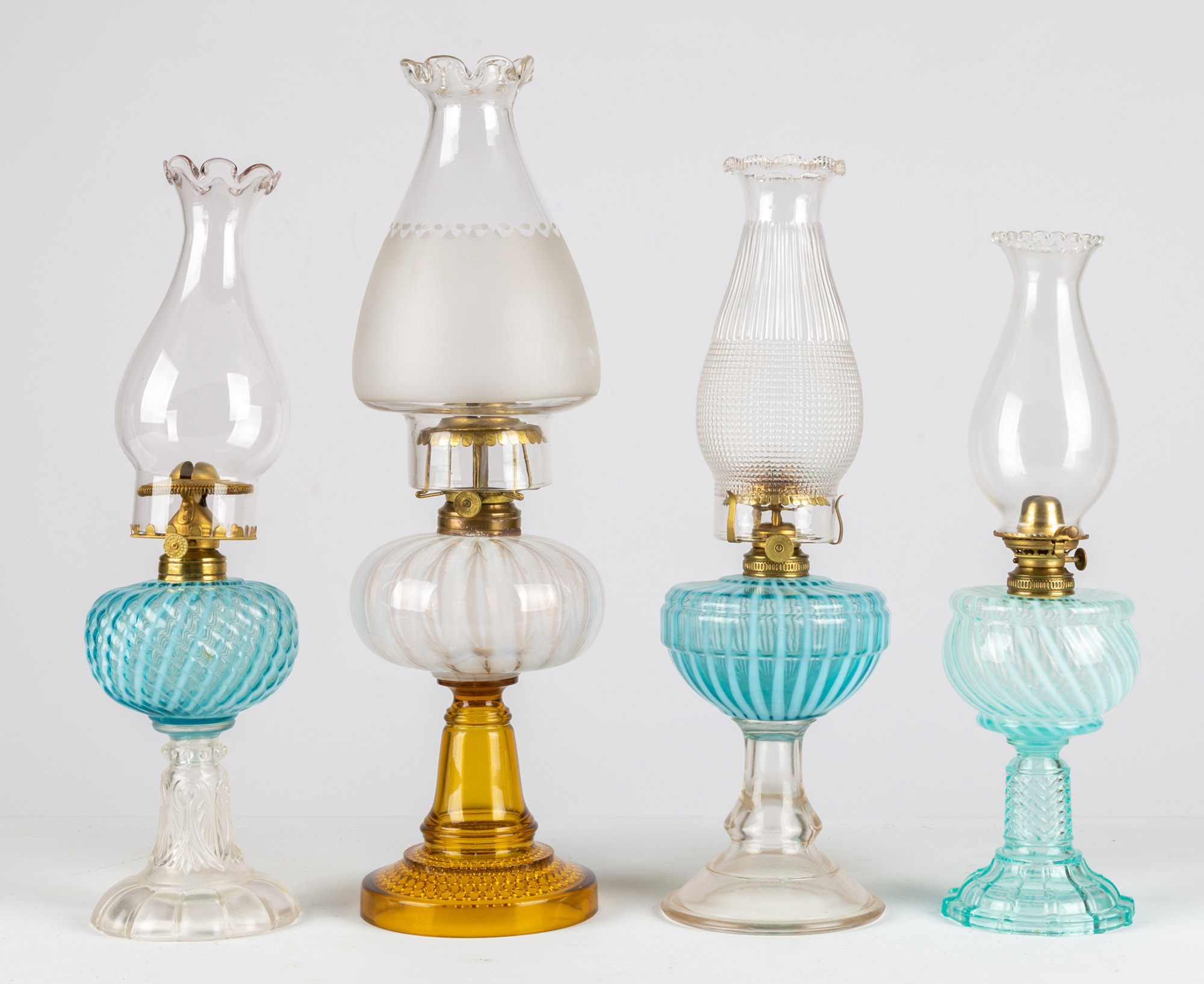 (4) Opalescent Swirl & Striped Oil Lamps | Cottone Auctions