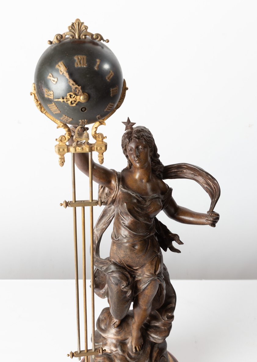 French Swinging Arm Clock | Cottone Auctions