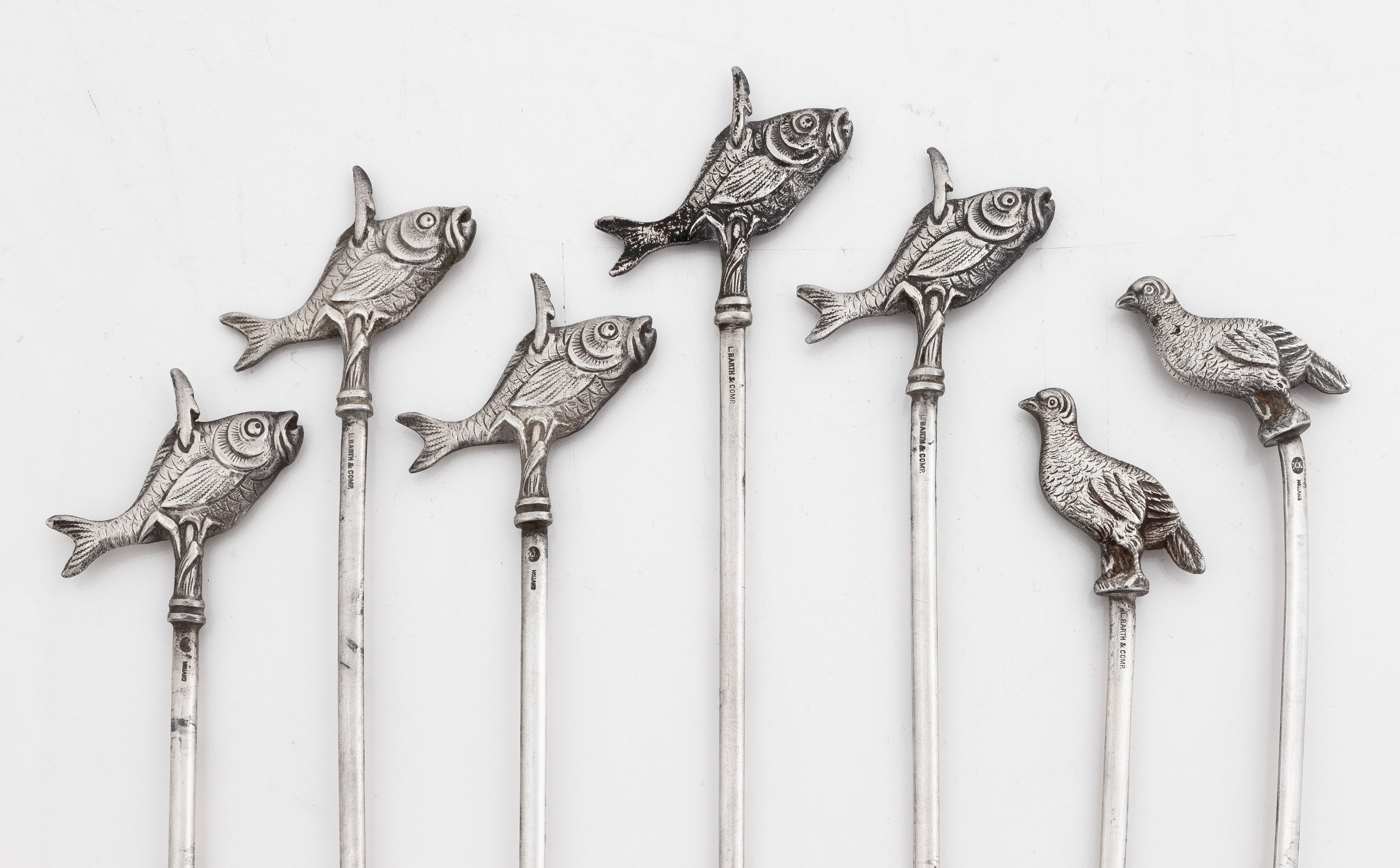 Seven Silver Meat Skewers | Cottone Auctions