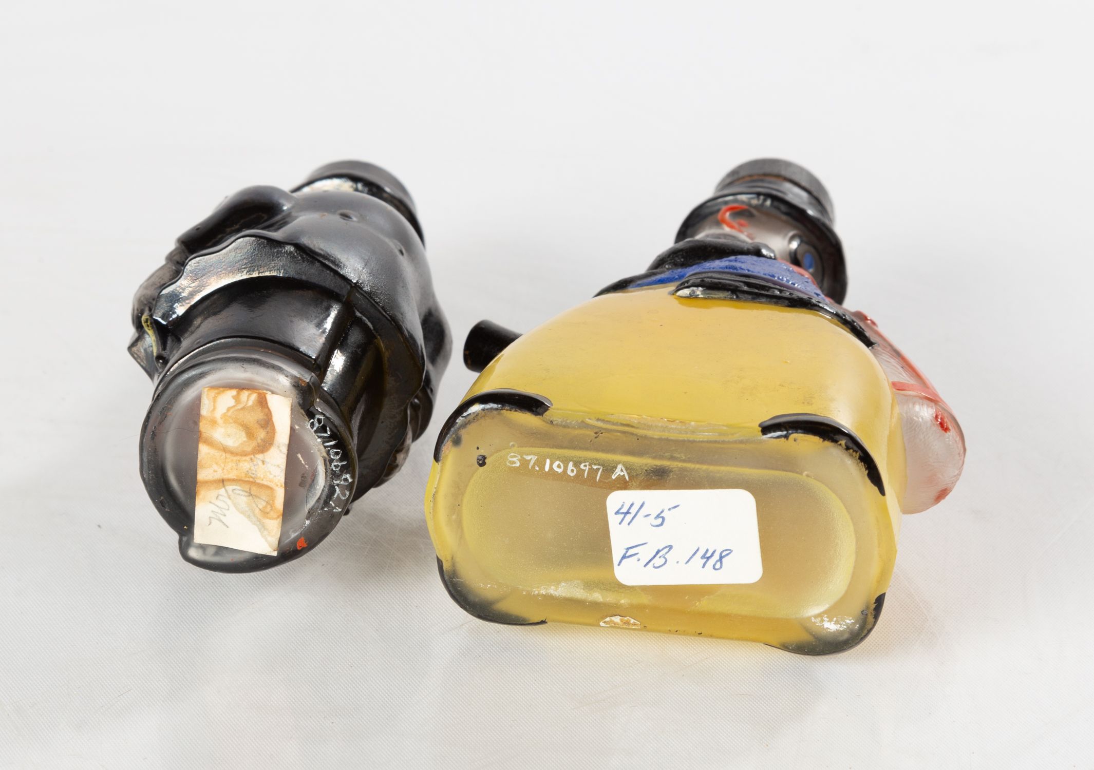 Barney and Sparky Perfume Bottles | Cottone Auctions