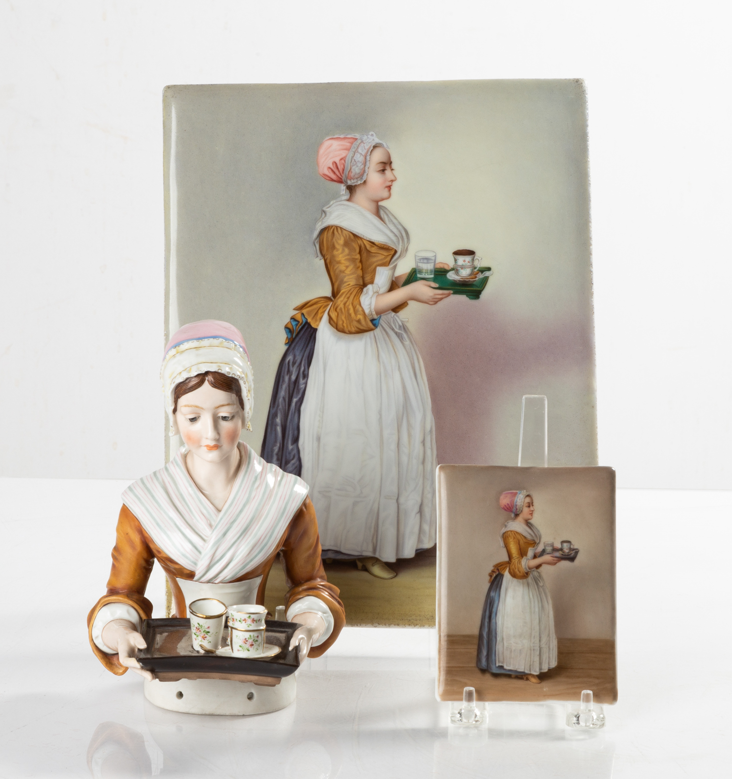 Porcelain Chocolate Girl Bust & Plaques | Cottone Auctions
