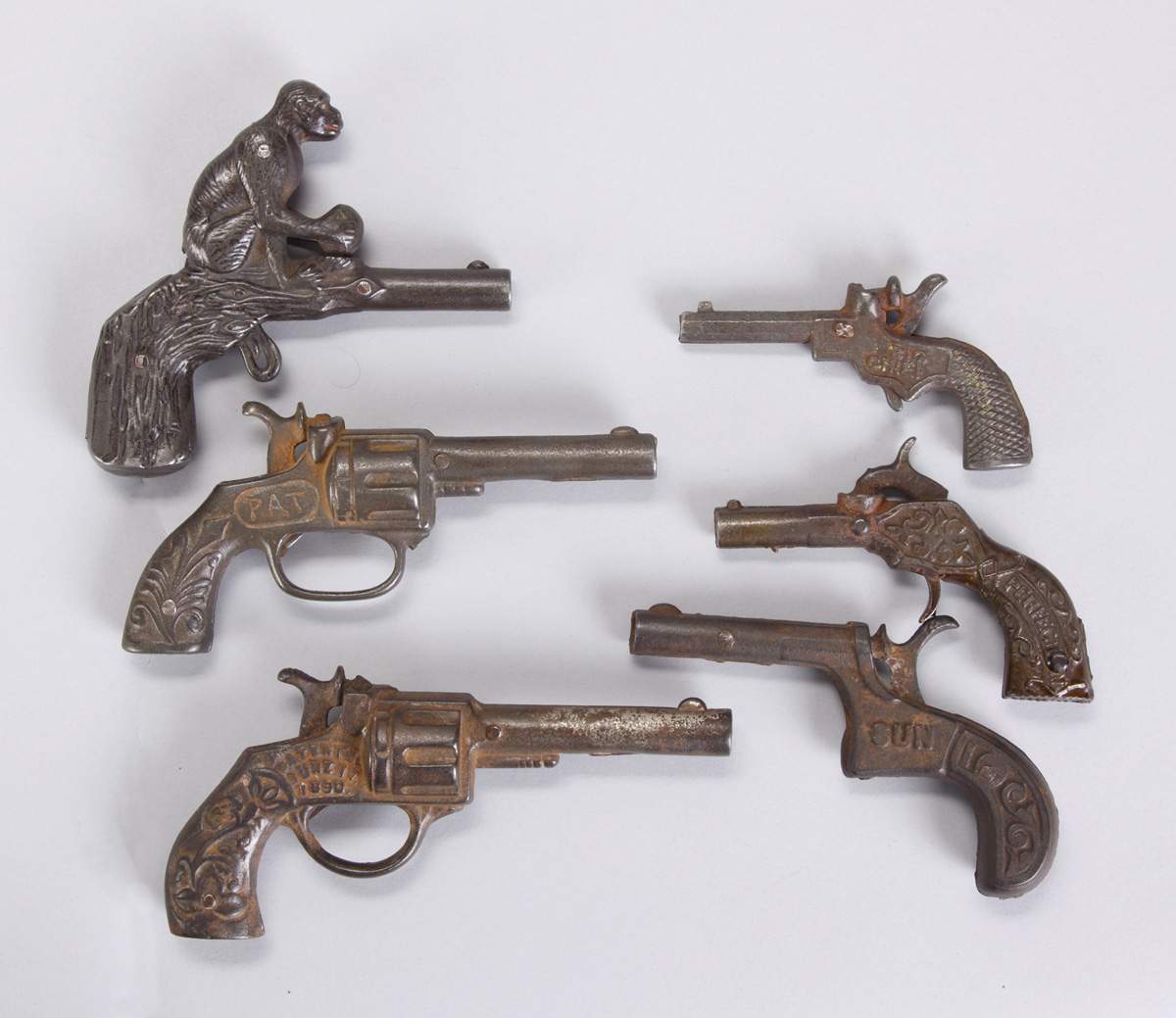 Cast Iron Cap Guns | Cottone Auctions