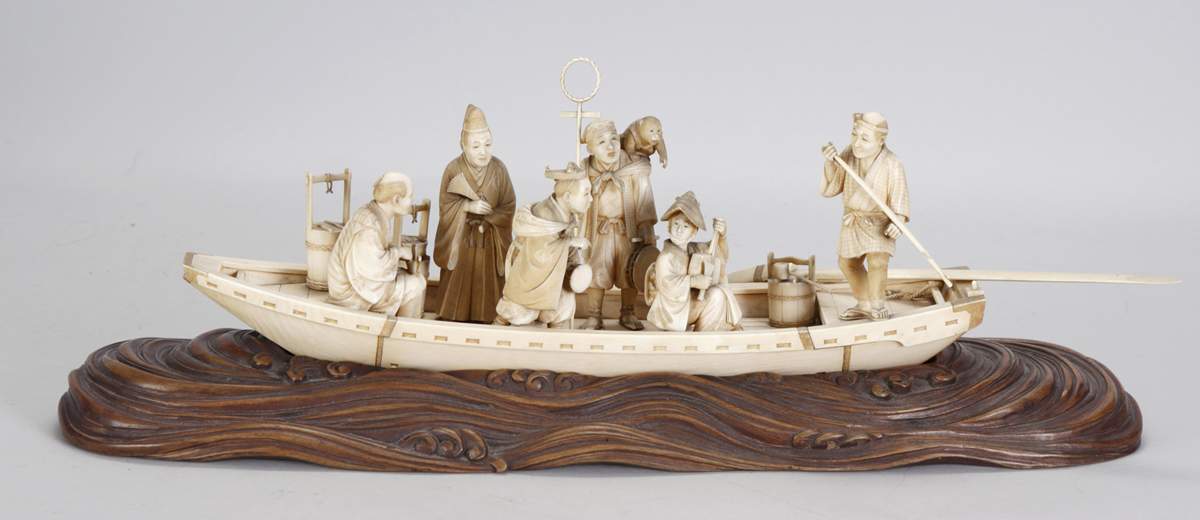 Carved Ivory Figural Group in Boat | Cottone Auctions