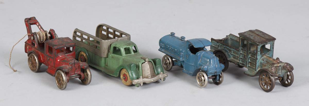Group of 4 Cast Iron Trucks | Cottone Auctions