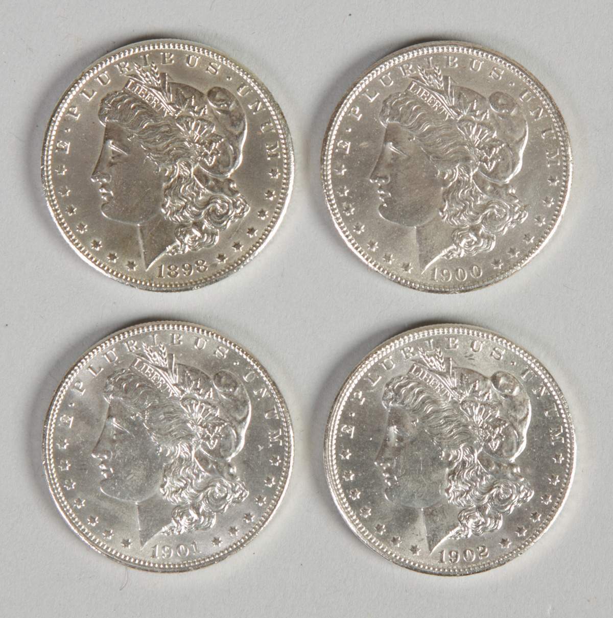 4 Morgan Head Silver Dollar Coins | Cottone Auctions