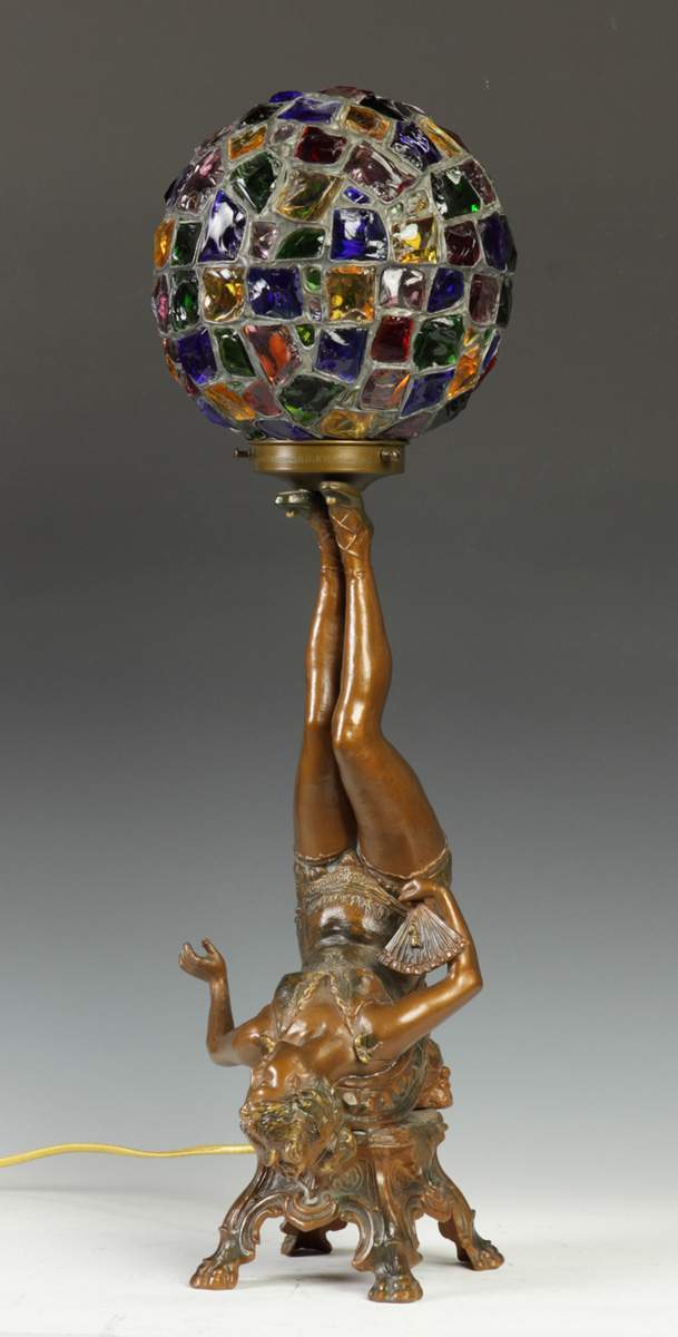 Patinated Metal Figural Young Lady Lamp holding a Leaded Glass Chunked ...