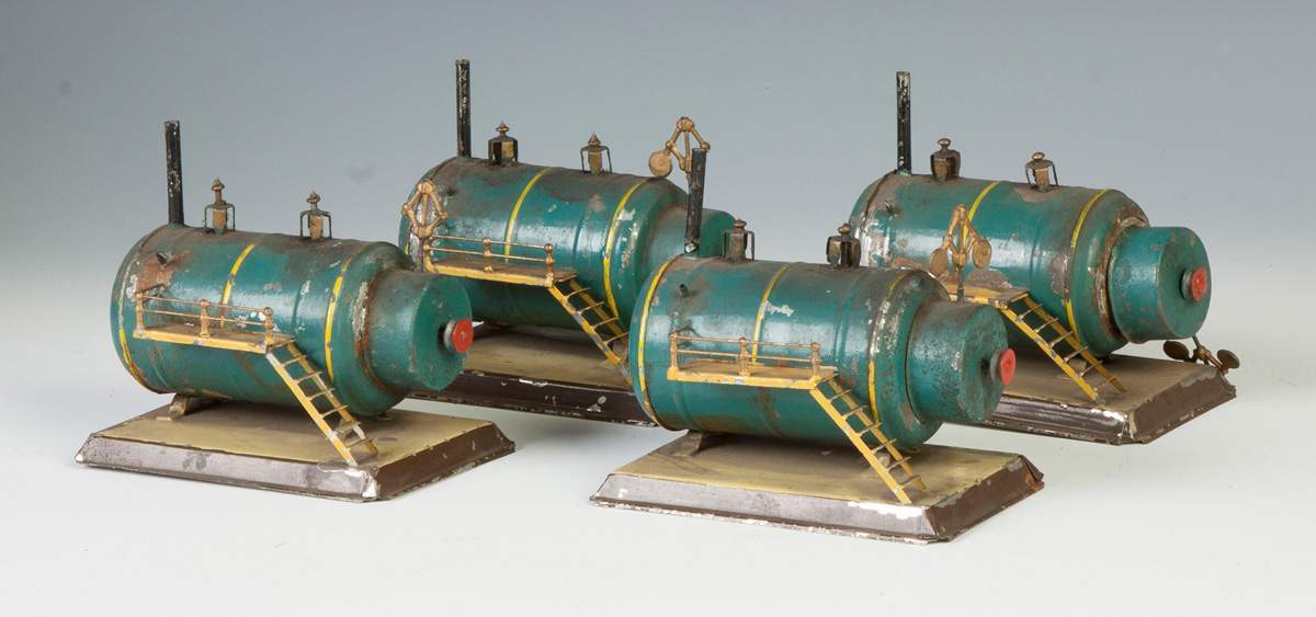 Four Hand Painted Tin Clockwork Engines | Cottone Auctions