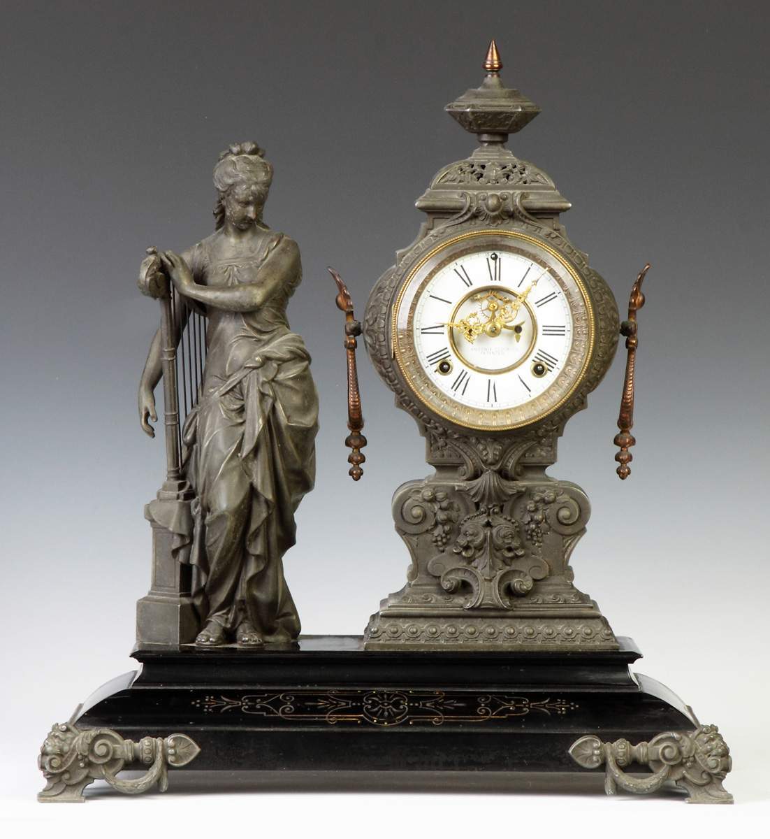 Ansonia Victorian Patinaed Metal Statue Clock | Cottone Auctions