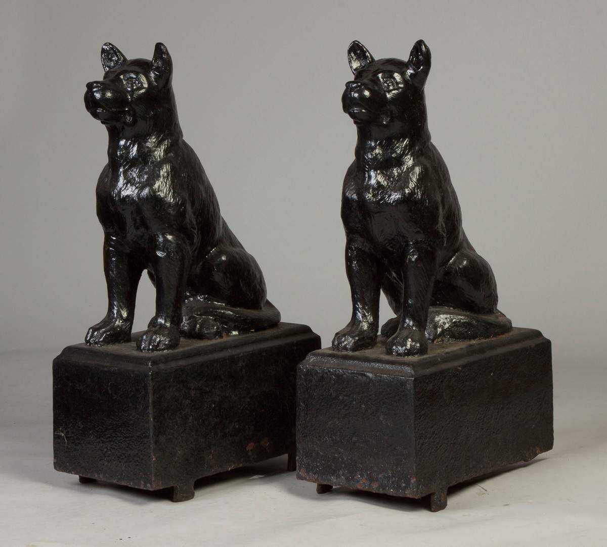Pair of Unusual Cast Iron Seated Dogs | Cottone Auctions