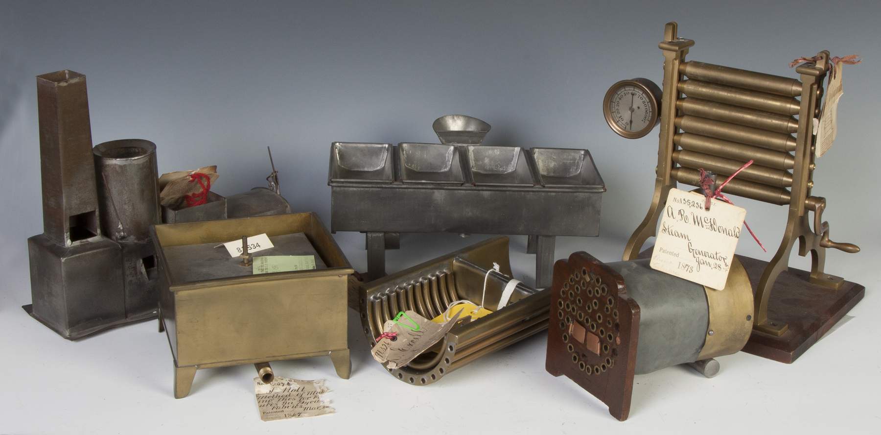 Group of Six Various Patent Models | Cottone Auctions
