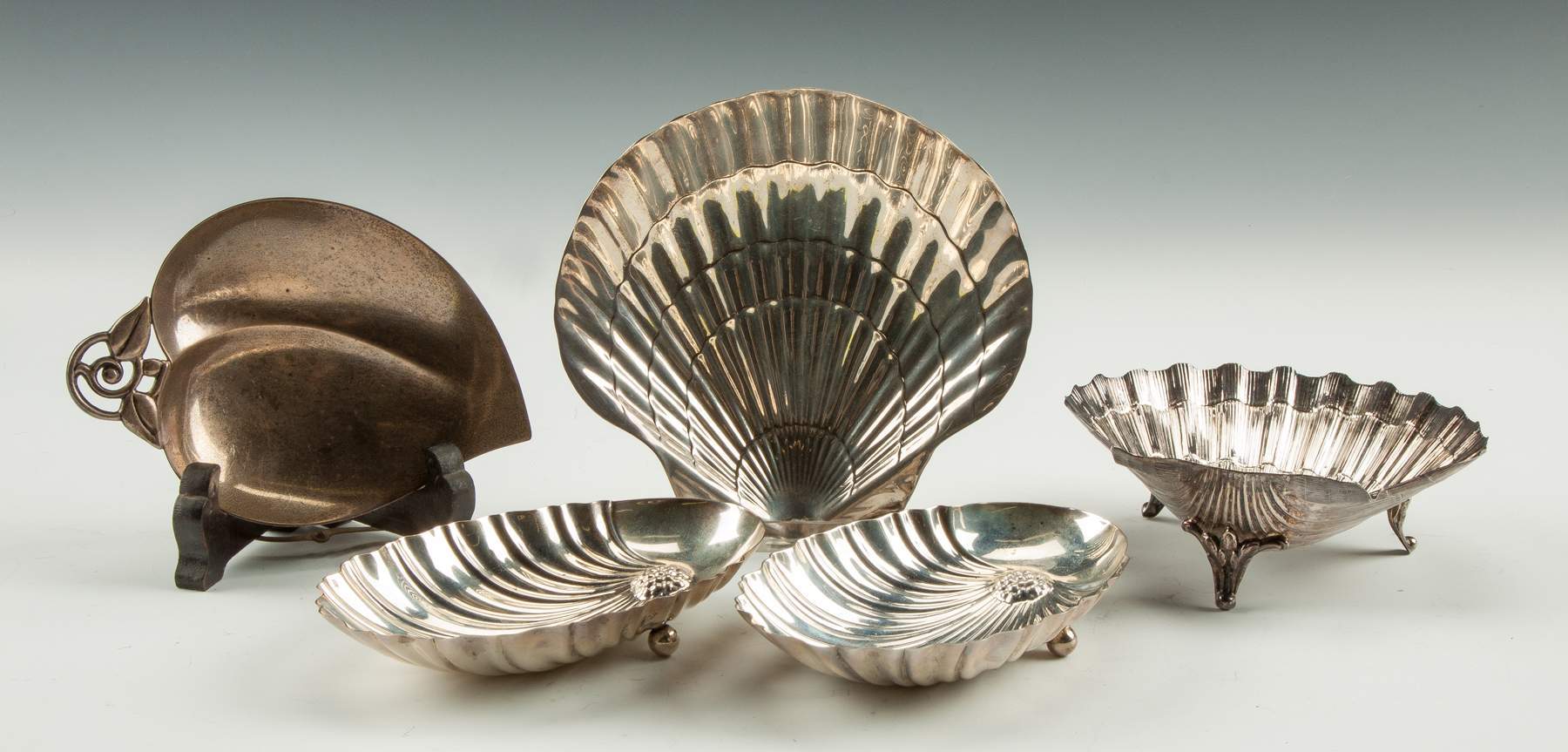 Group of Sterling Silver Shell Shaped Table Articles | Cottone Auctions